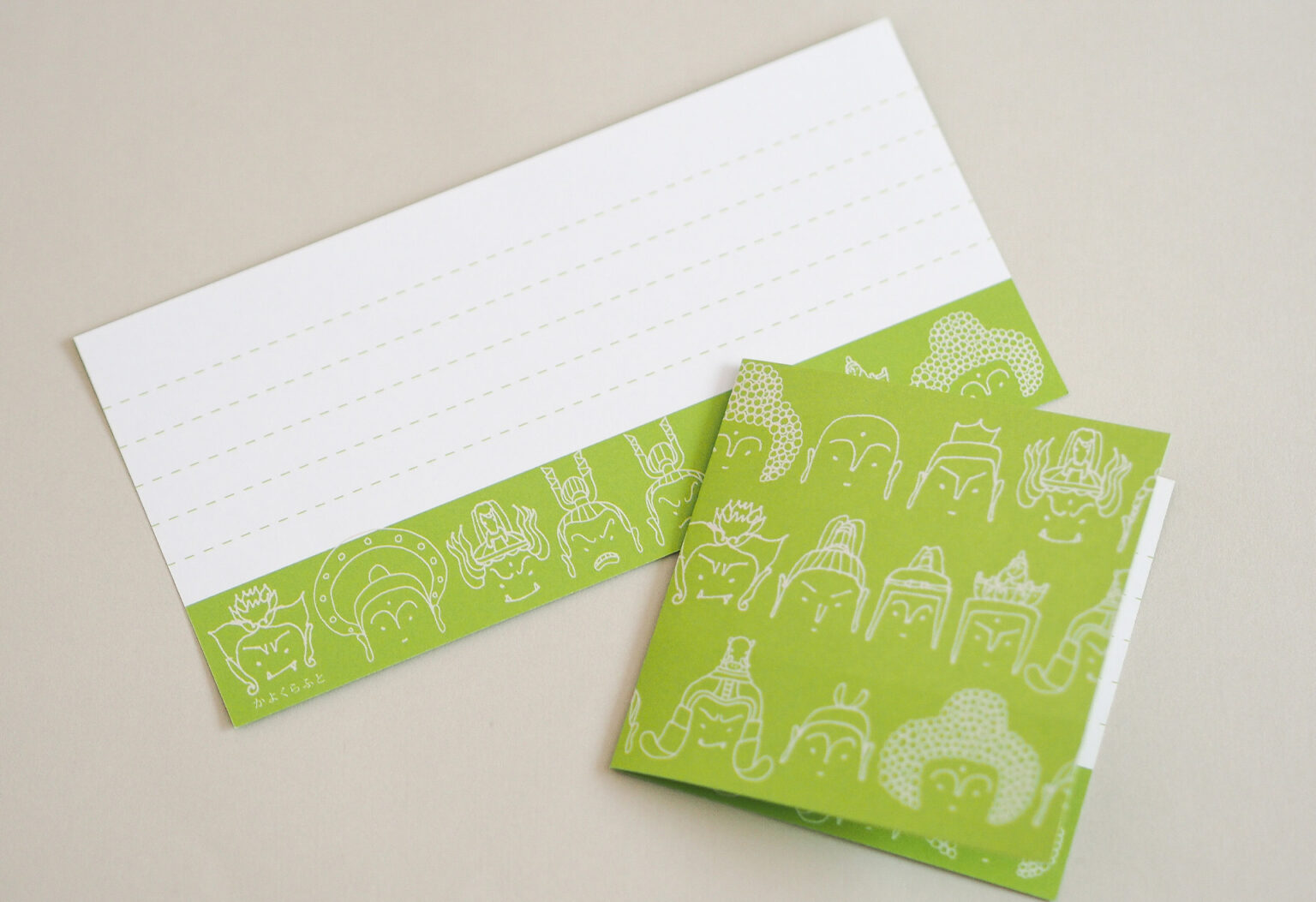 落ち着いた緑色に描かれたイラストを見ていると